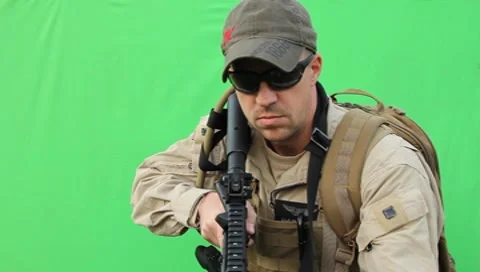 Special Operations soldier aiming at cam... | Stock Video | Pond5