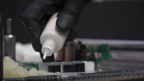 A special paint for doing the tattoo. Pr... | Stock Video | Pond5