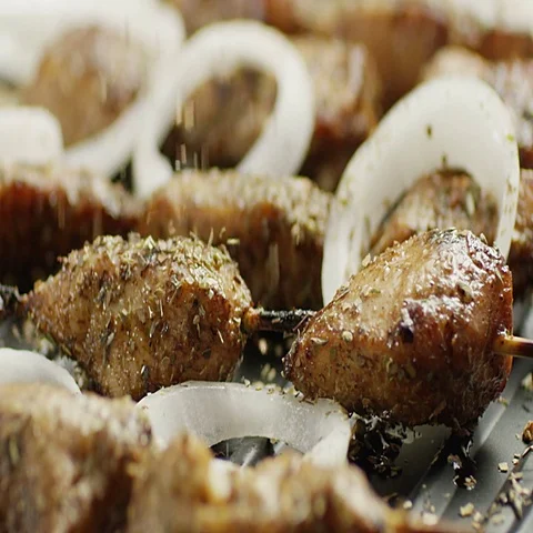 Species are falling on barbeque in slow ... | Stock Video | Pond5