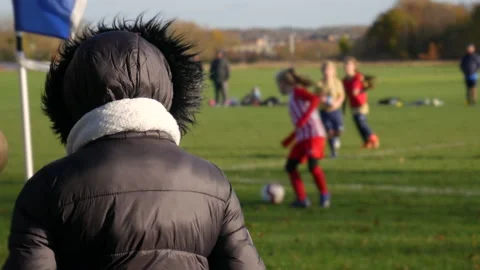Spectator watching a group of children p... | Stock Video | Pond5