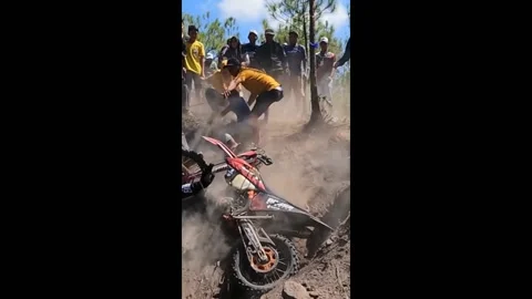 Spectators narrowly escape injury as bik... | Stock Video | Pond5