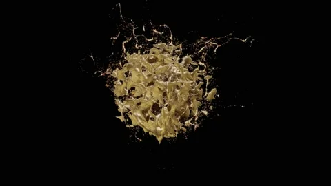 Sphere forming from scattered particles ... | Stock Video | Pond5