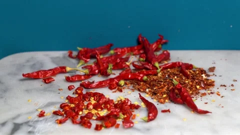 Spicy red chilli - cut and cook with chi... | Stock Video | Pond5
