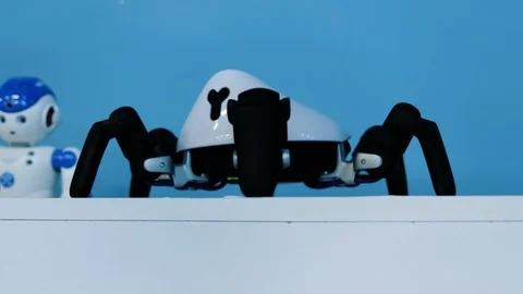 Spider robot dancing on the table | Stock Video | Pond5