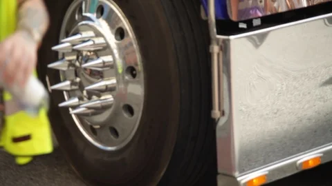 Spiky fetish chrome truck wheels at Euro... | Stock Video | Pond5