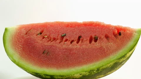 Spin watermelon on a white background, c... | Stock Video | Pond5