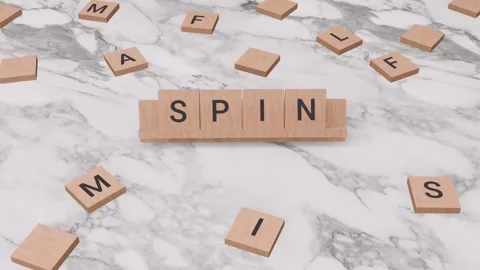 Spin word written on scrabble | Stock Video | Pond5