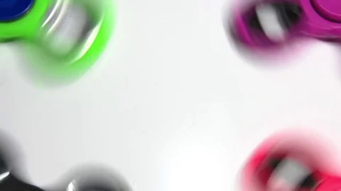 Spinners spinning on a white background | Stock Video | Pond5
