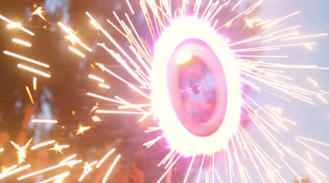 Spinning firework wheel, sparkles all ar... | Stock Video | Pond5