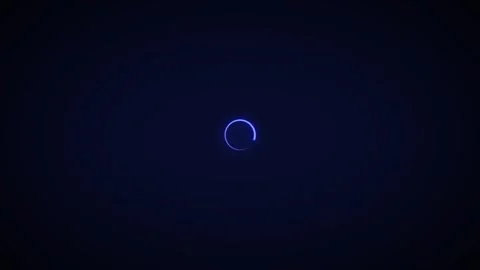 Spinning loading wheel with blue glow, d... | Stock Video | Pond5