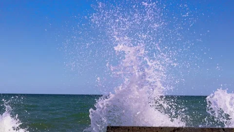 Splash from the waves breaking on the gr... | Stock Video | Pond5