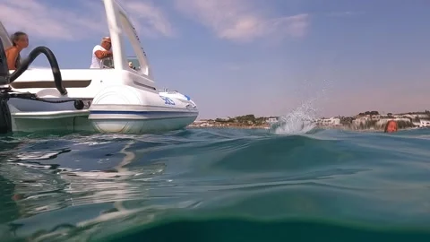 Split Underwater Scene of Woman Diving f... | Stock Video | Pond5