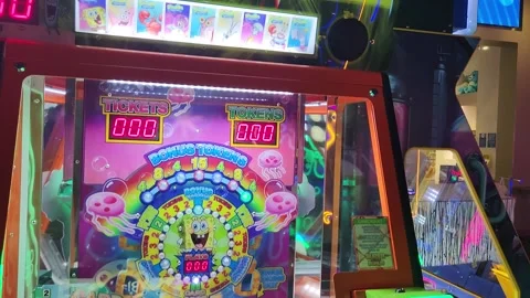 Spongebob Token Arcade Game Machine Box | Stock Video | Pond5