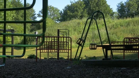 Spooky swing, swinging on its own in an ... | Stock Video | Pond5