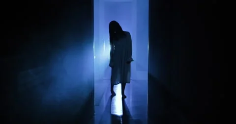 Spooky Woman in Silhouette Creeping Towa... | Stock Video | Pond5