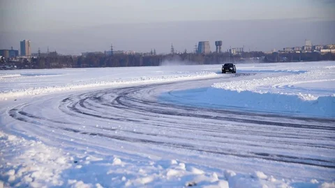 Sport car racing on snow race track in w... | Stock Video | Pond5