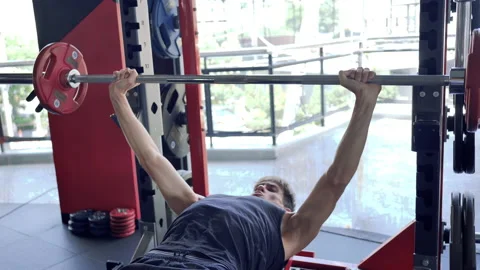 Sport male during lift weight at gym, Mu... | Stock Video | Pond5