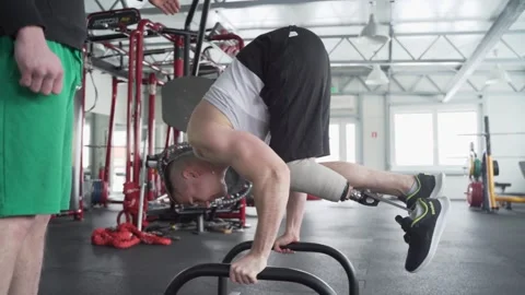 Sportive man with prosthetic leg balanci... | Stock Video | Pond5
