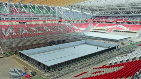 Sports stadium with swimming pool in pro... | Stock Video | Pond5