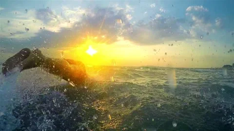 Sportsman Jump Sea Water at Sunset, SLOW... | Stock Video | Pond5