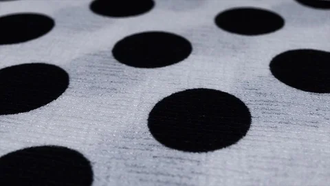 Spotted fabric cloth close up shot. Blac... | Stock Video | Pond5