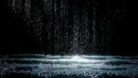 Spray spatters rain fall against on the ... | Stock Video | Pond5
