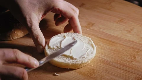Spreading Mayonnaise On Burger Bun With ... | Stock Video | Pond5