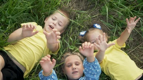 Spring fun at the playground. Happy chil... | Stock Video | Pond5