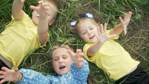 Spring fun at the playground. Happy chil... | Stock Video | Pond5