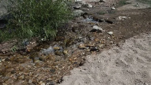 Spring water coming from the rocks at Pe... | Stock Video | Pond5