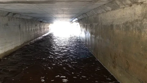 Spring water flow through concrete box c... | Stock Video | Pond5