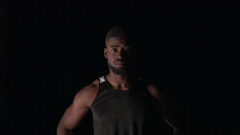 Sprinter Looking at the Camera with a To... | Stock Video | Pond5