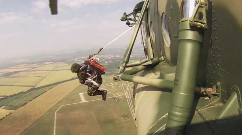 Jumping Out Of Helicopter Stock Footage ~ Royalty Free Stock Videos | Pond5