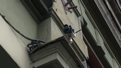 Square CCTV camera fixed on the wall | Stock Video | Pond5