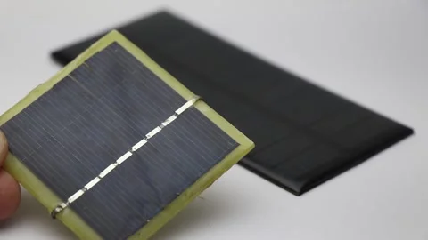 Square solar panel held in hand with big... | Stock Video | Pond5