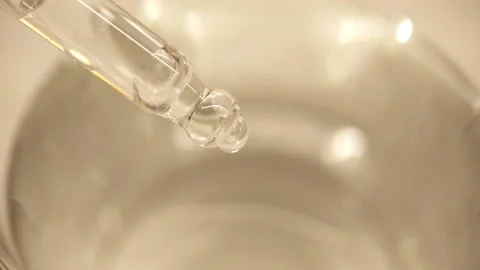 Squeeze a drop of light liquid from a pi... | Stock Video | Pond5