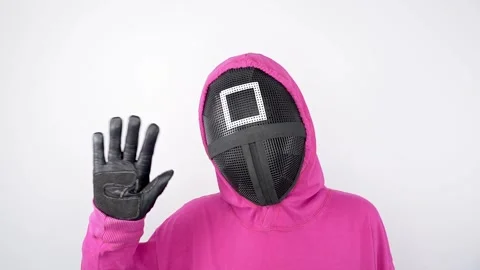 Squid Game pink guard dancing with wavin... | Stock Video | Pond5