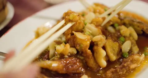 Squirrel Mandarin Fish dish in chinese r... | Stock Video | Pond5