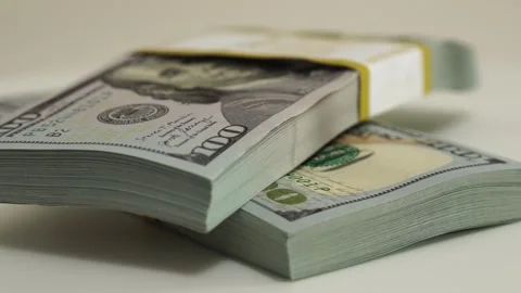 stack of bank bundles with US dollars on... | Stock Video | Pond5