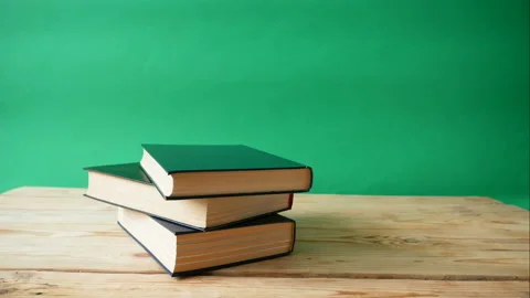 Stack of books background, many books pi... | Stock Video | Pond5