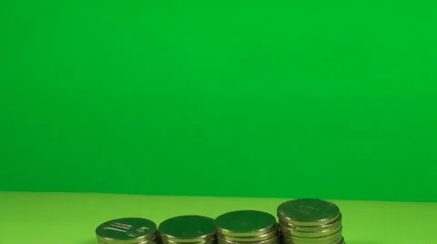 Stack Of Coins On A Green Screen, Chroma... | Stock Video | Pond5