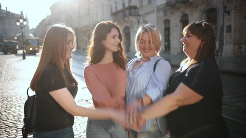 Stack hands out palms together as unity,... | Stock Video | Pond5