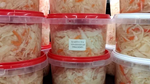 Stack of packaged and canned food in gro... | Stock Video | Pond5