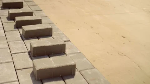 stack of paving slabs stands in row. pan... | Stock Video | Pond5