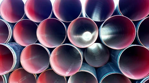 Stack of pipes for sewage or water suppl... | Stock Video | Pond5