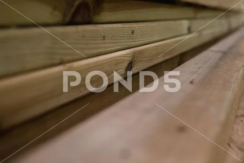 A Stack of pressure impregnated hardwood for home building. DIY concept ...