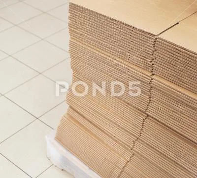 A stack of sheets of industrial packaging board. Cardboard Sheets for ...