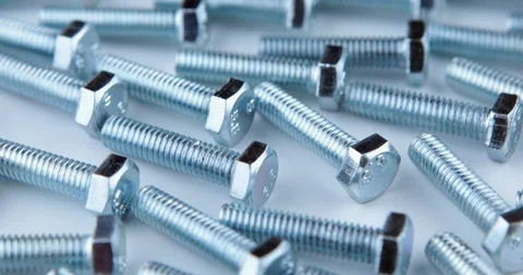 Stack of shiny nuts rotating on a white ... | Stock Video | Pond5