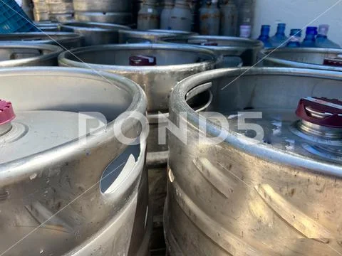 Stacked Barrels of Beer, metal pub kegs ~ Premium Photo #222035959