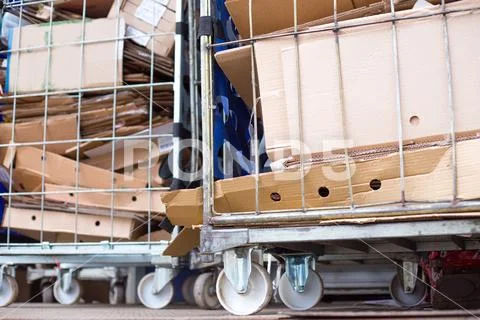 Stacked used cardboard boxes ready for recycling Stock Image #98527926